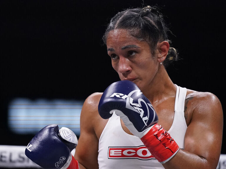 Serrano dominates Ramos to retain titles in historic 12-round bout ...