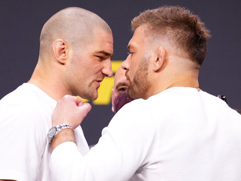 Watch: Strickland, Du Plessis come to blows cageside at UFC 296 ...