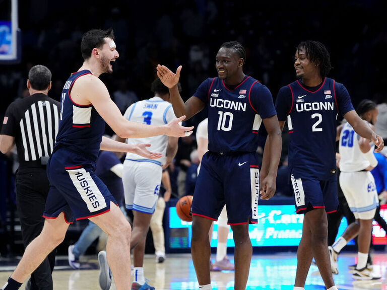 Spencer scores 19 points, No. 4 UConn holds off Xavier on the road ...