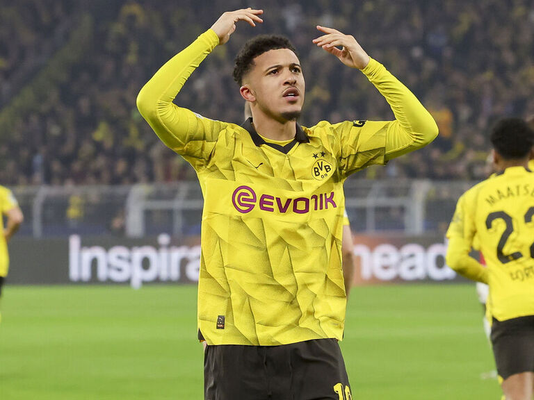 Sancho helps Dortmund squeeze into UCL quarters with win over PSV ...
