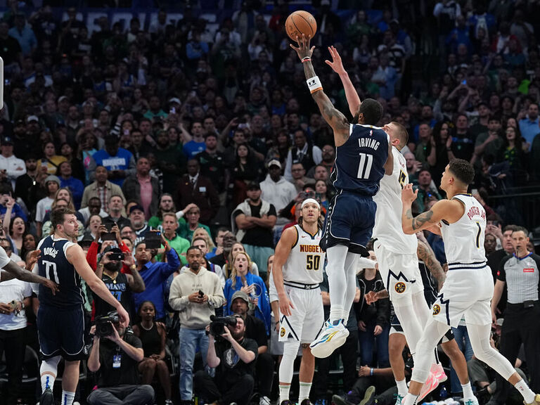 Kyrie Irving's running left-hander at the buzzer lifts Mavs over ...
