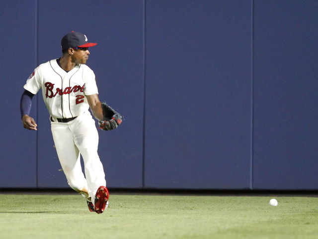 GIF: B.J. Upton tries to barehand easy play, runner takes 2…