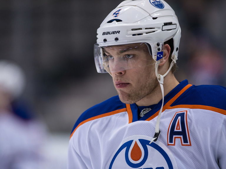 Taylor Hall suffers injury slamming into Canucks' post | theScore.com