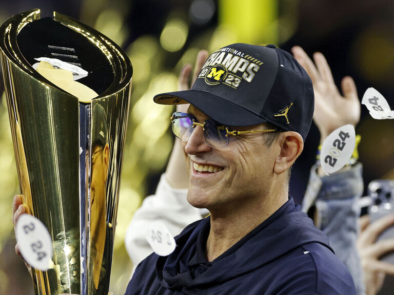 Harbaugh won't serve as honorary captain for Michigan's season opener ...