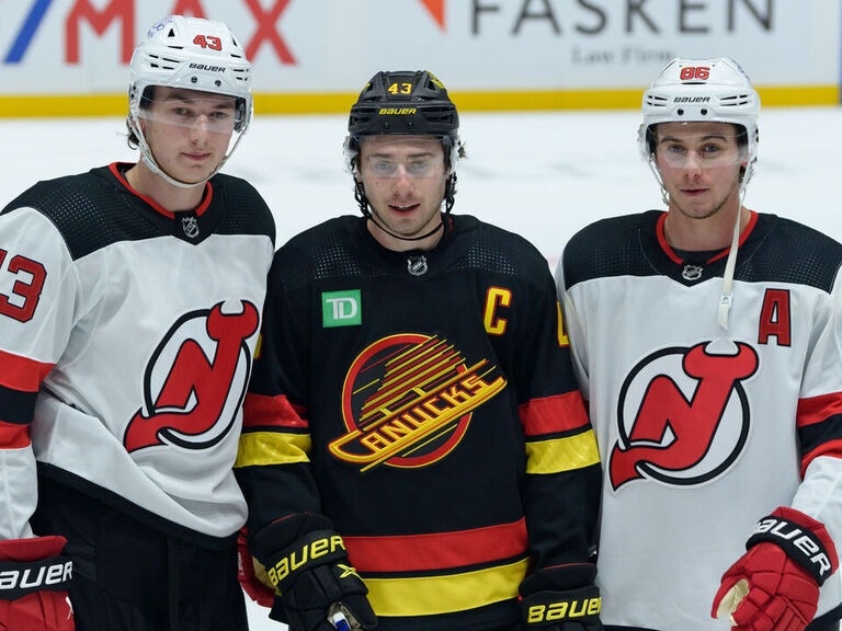 Rutherford: Keeping Quinn Hughes easier 'if we brought his brothers ...