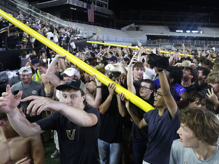 Vanderbilt, Arkansas fined for fans storming field after upset wins ...