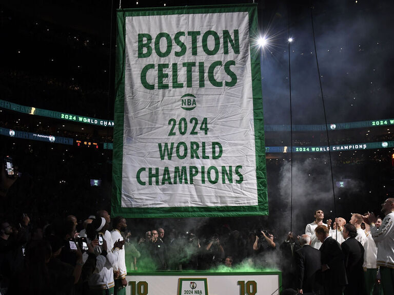 Celtics receive championship rings, raise banner: 'Let's do it again ...