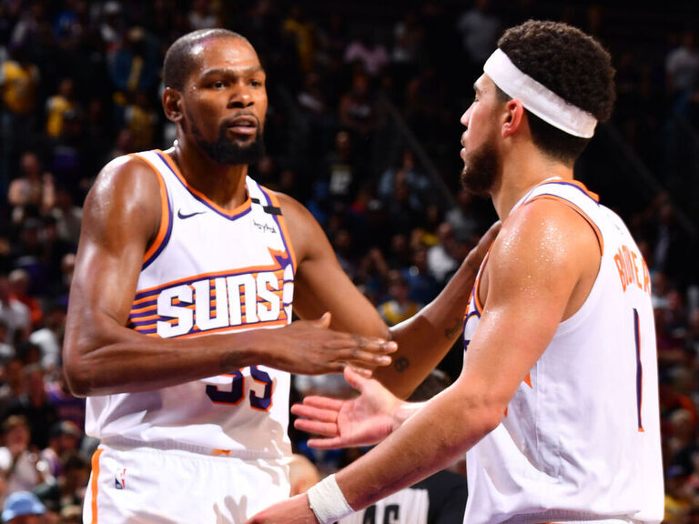 Booker scores 33, Suns come back to hand Lakers 1st loss | theScore.com