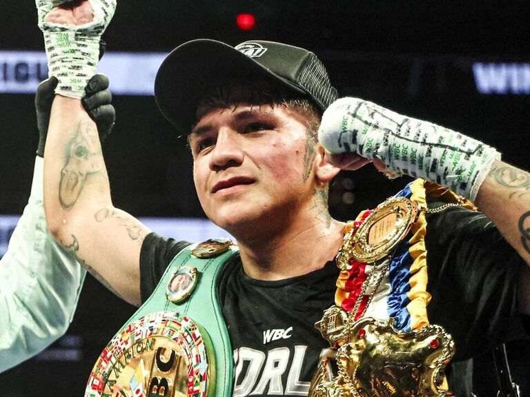 'Bam' Rodriguez keeps 115-pound title with uppercut TKO of Guevara ...