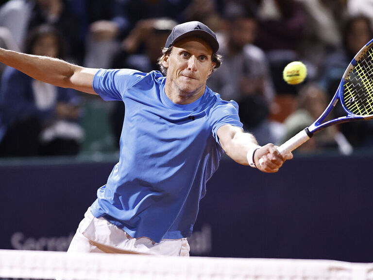 Diego Forlan's professional tennis debut begins with loss at Uruguay ...