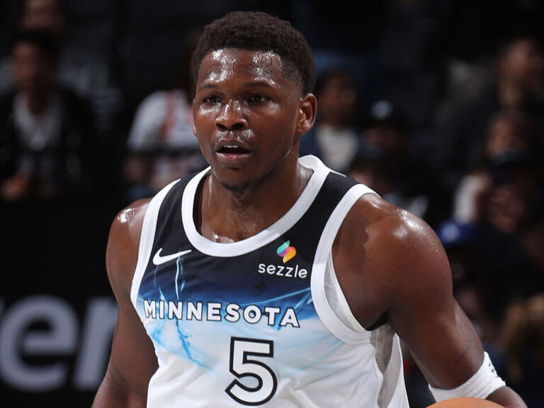 Ant shakes off injury scare to lead T-Wolves past Nets | theScore.com