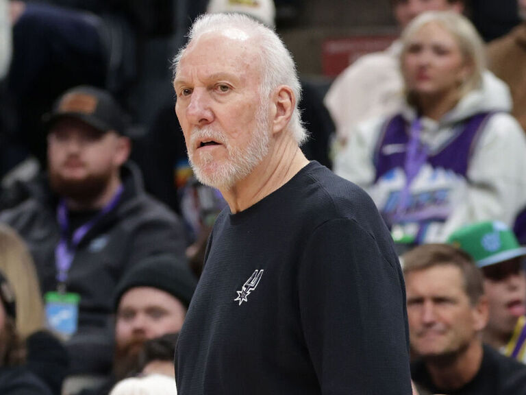 Popovich makes 1st public appearance since stroke at Johnson's ...