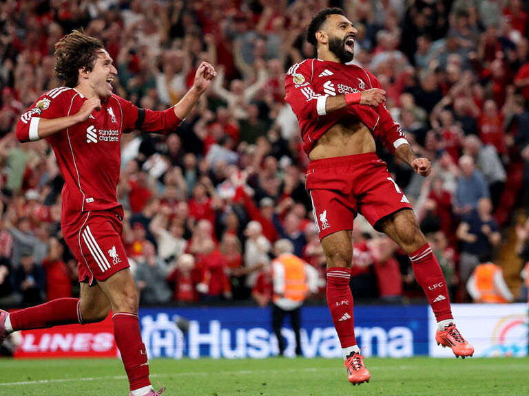 Emotional Liverpool begin title defense with wild win over Bournemouth ...