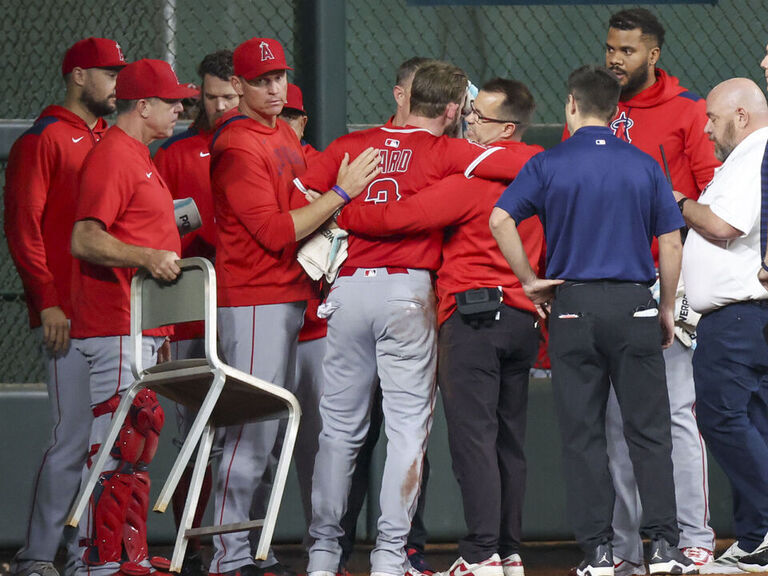 Angels' Ward bloodied, carted off after hitting face against scoreboard ...