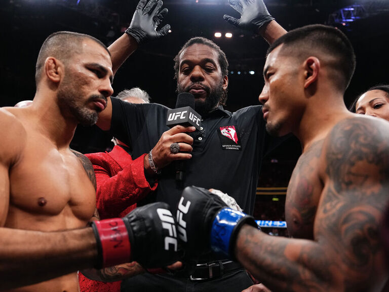 Van wins UFC flyweight title after Pantoja injures arm | theScore.com