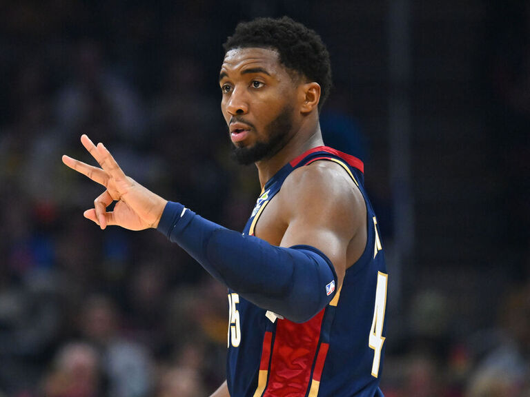 Mitchell scores 33 to help Cavs sneak past undermanned Nuggets ...