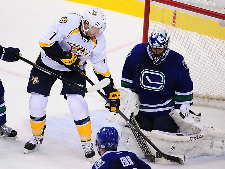 PHOTO: Canucks' store unveils 'Johnny Canuck' fashion jersey | theScore.com