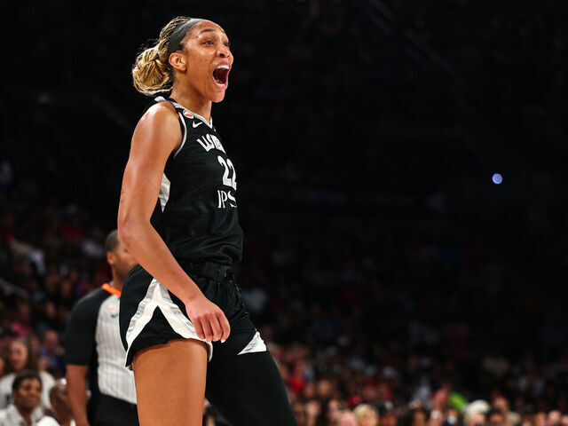 Wilson reaches 6K points in record pace as Aces top Storm